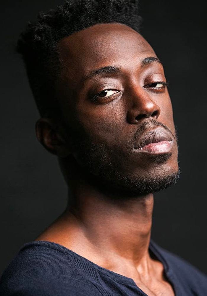 Charles Mnene biografia